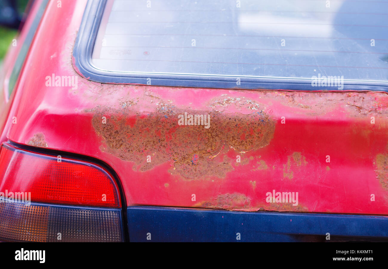 texture background rust on the hood of the car, Red car Stock Photo - Alamy