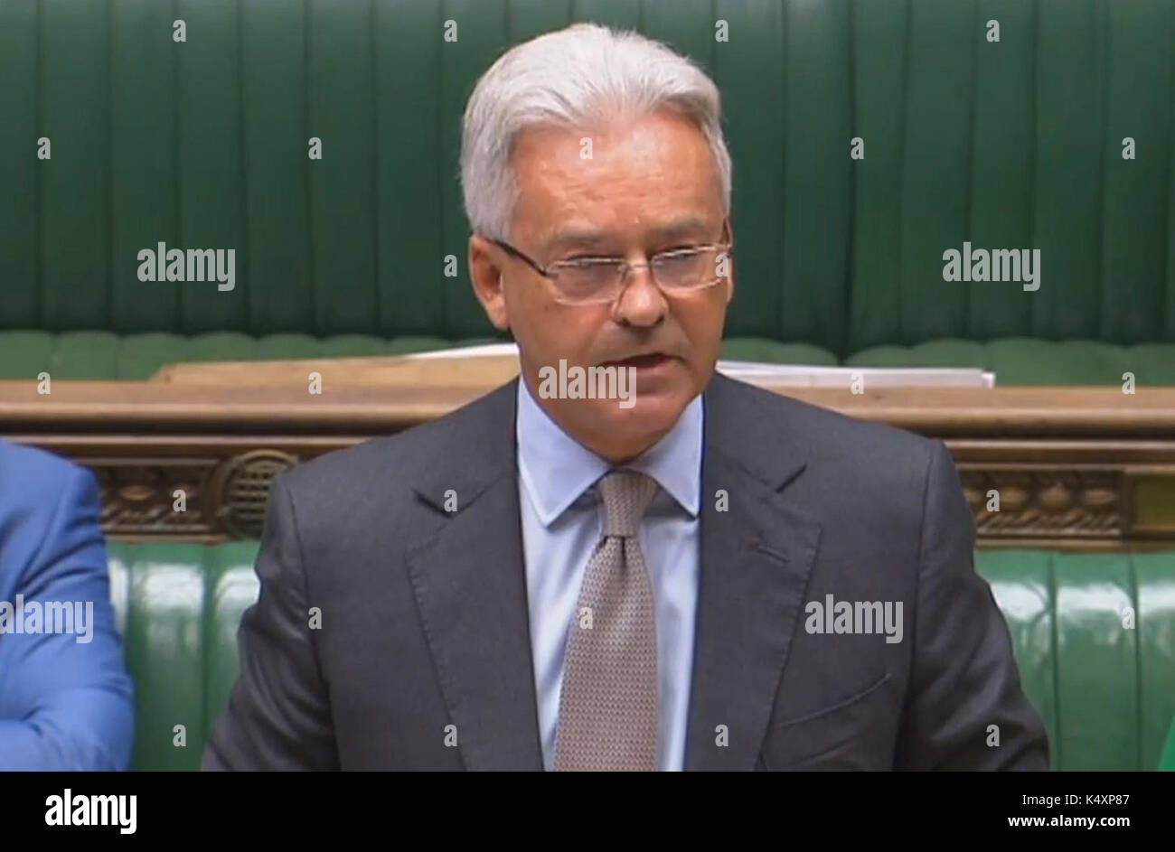 Foreign and Commonwealth Affairs minister Sir Alan Duncan reads a ... Foreign and Commonwealth Affairs minister Sir Alan Duncan reads a ...