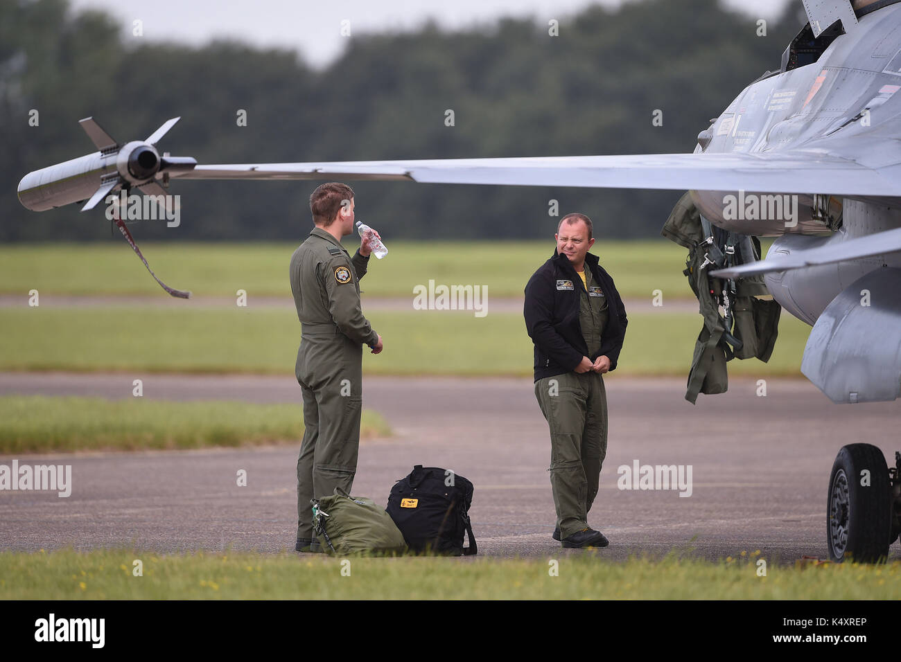 Pilot Tom 'Gizmo' De Moortel (right) arrives in his Belgian F-16 ...