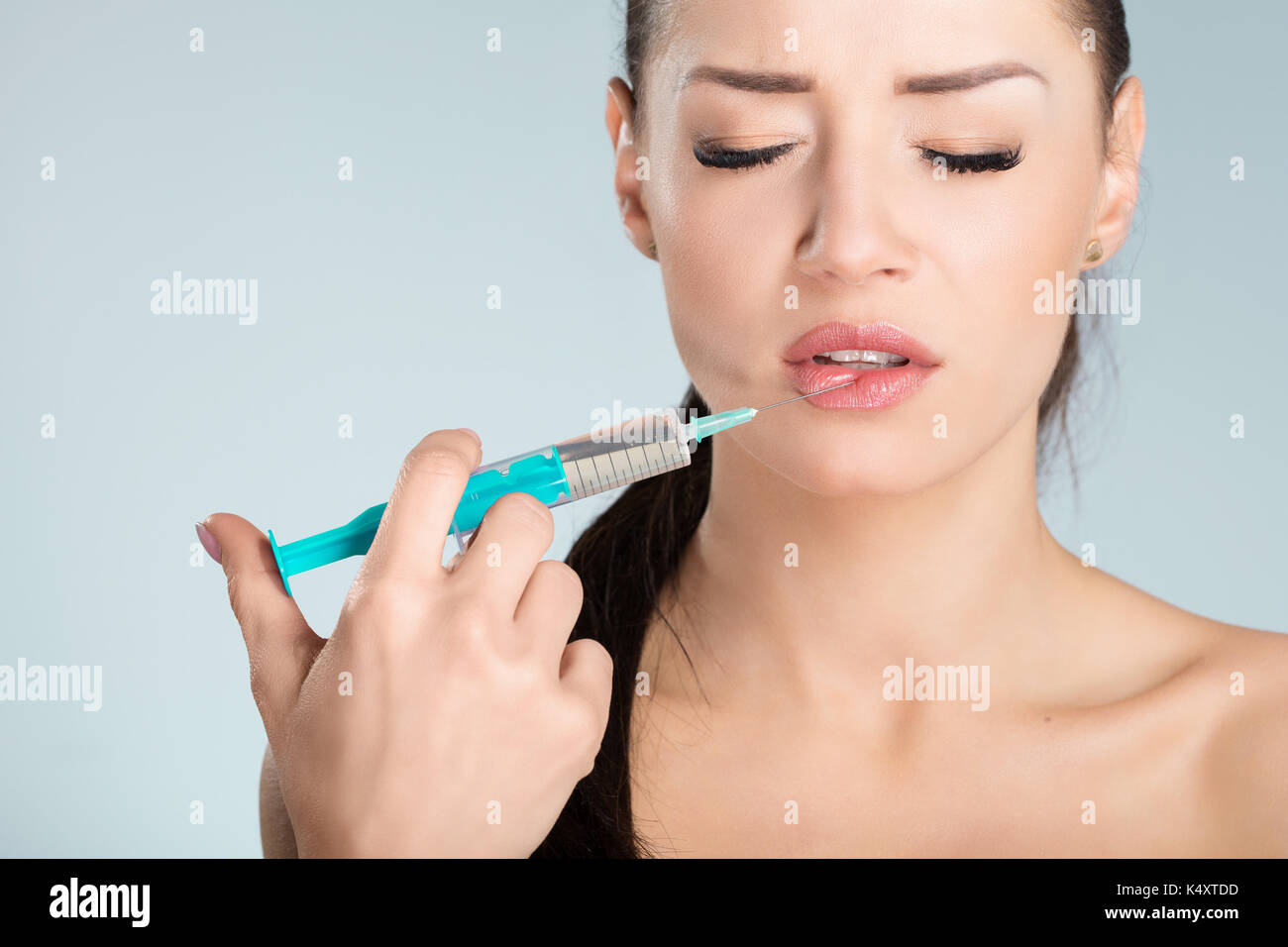 Lips injection hi-res stock photography and images - Alamy