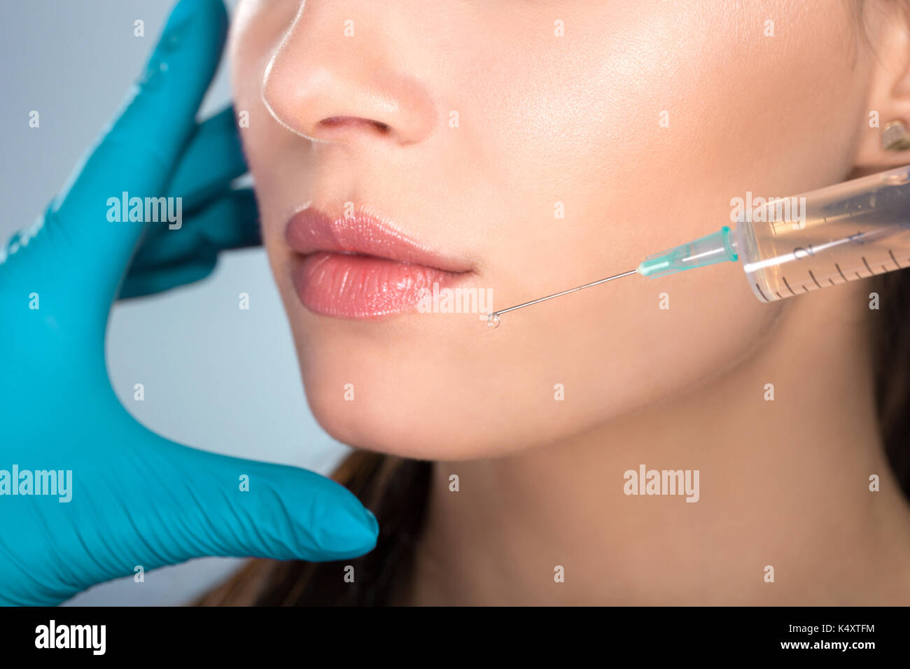 Cropped portrait of woman face and syringe with medication Stock Photo ...