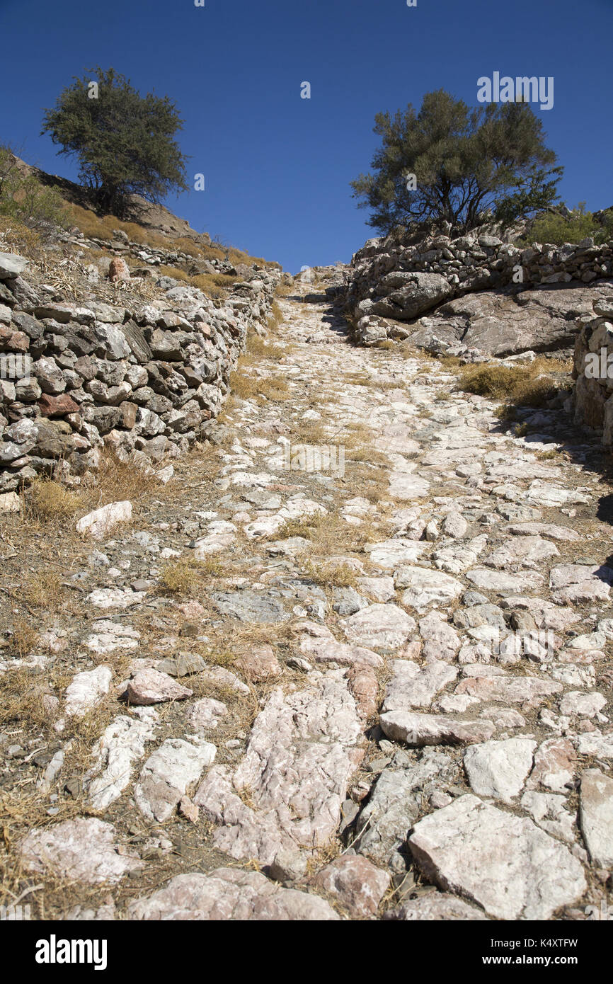 Stone pathway in the abandoned village of Mikro Horio, Tilos, Greece ...
