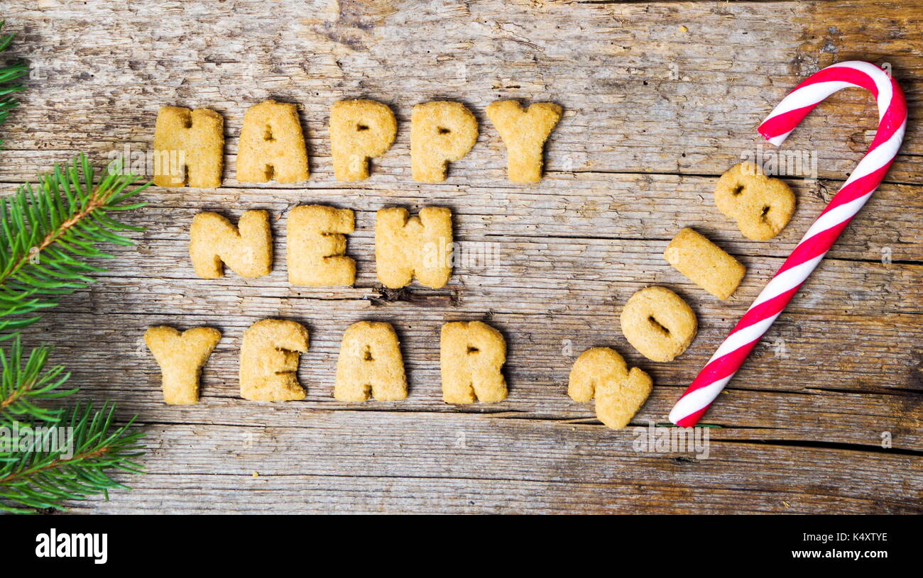 Happy new year note written with cookie letters Stock Photo - Alamy