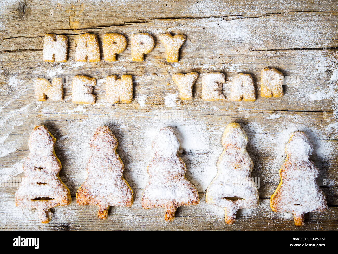 Happy new year note written with cookie letters Stock Photo - Alamy