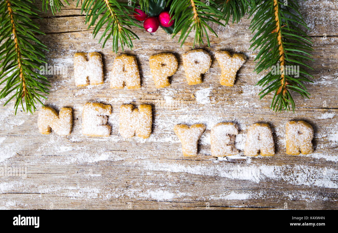 Happy new year note written with cookie letters Stock Photo - Alamy