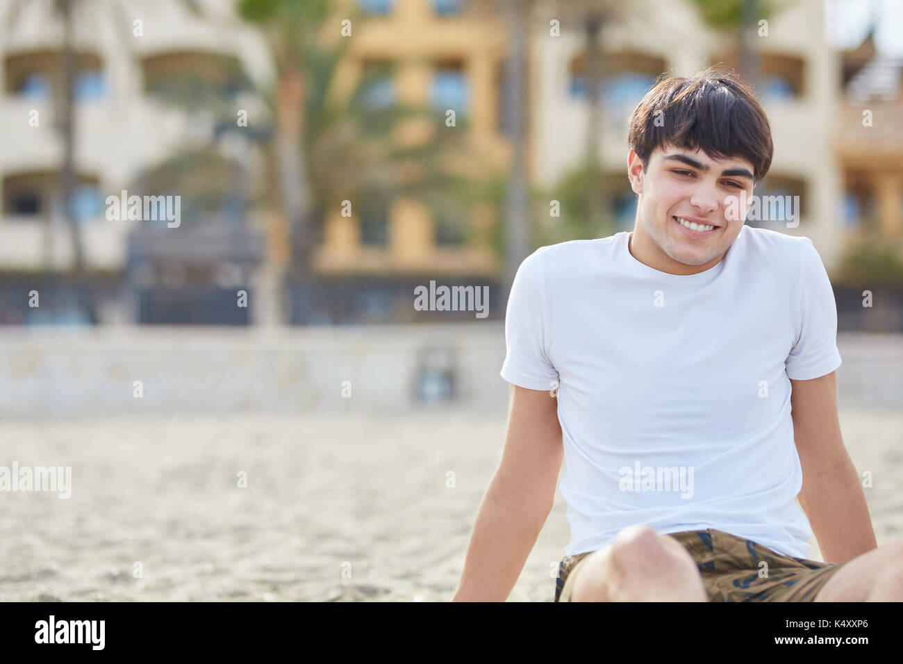 Man relaxing on beach hi-res stock photography and images - Alamy