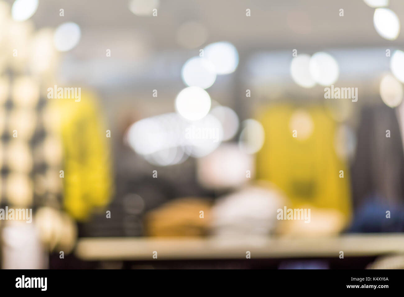 Blurred a clothes store background on a shopping mall Stock Photo - Alamy