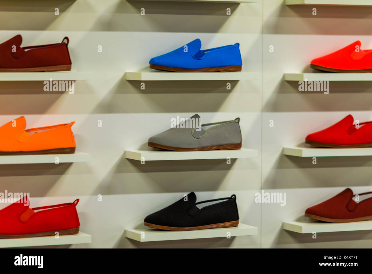The shoes store background on a shopping mall Stock Photo - Alamy