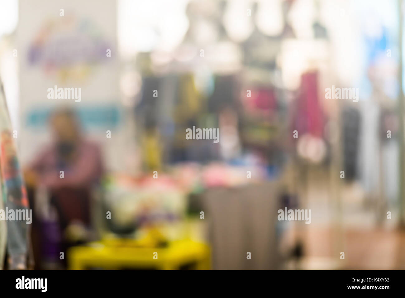 Blurred a clothes store background on a shopping mall Stock Photo - Alamy
