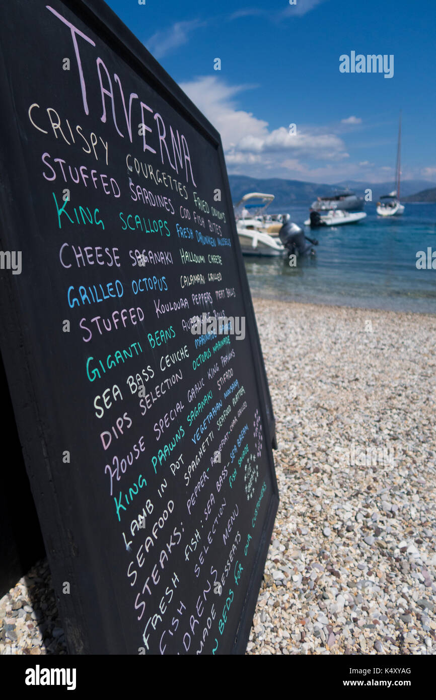 Hand Written Menu On Beach Outside Greek Taverna Stock Photo - Alamy