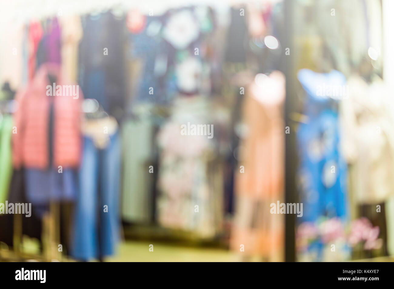 Blurred a clothes store background on a shopping mall Stock Photo - Alamy