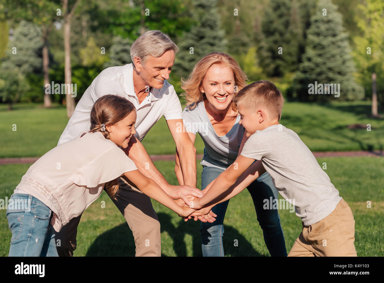 family holding hands Stock Photo - Alamy