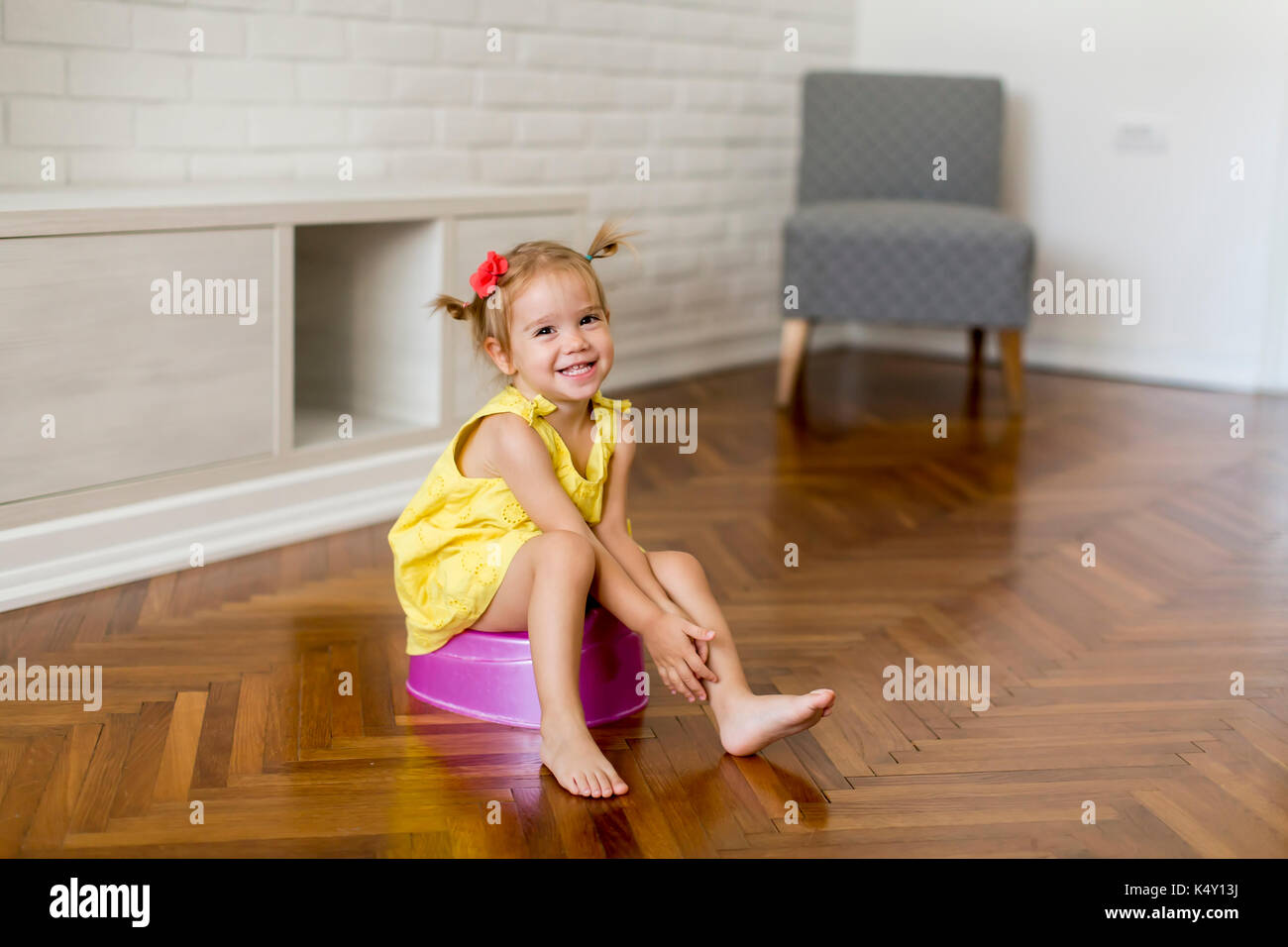 Toddler on potty hi-res stock photography and images - Alamy