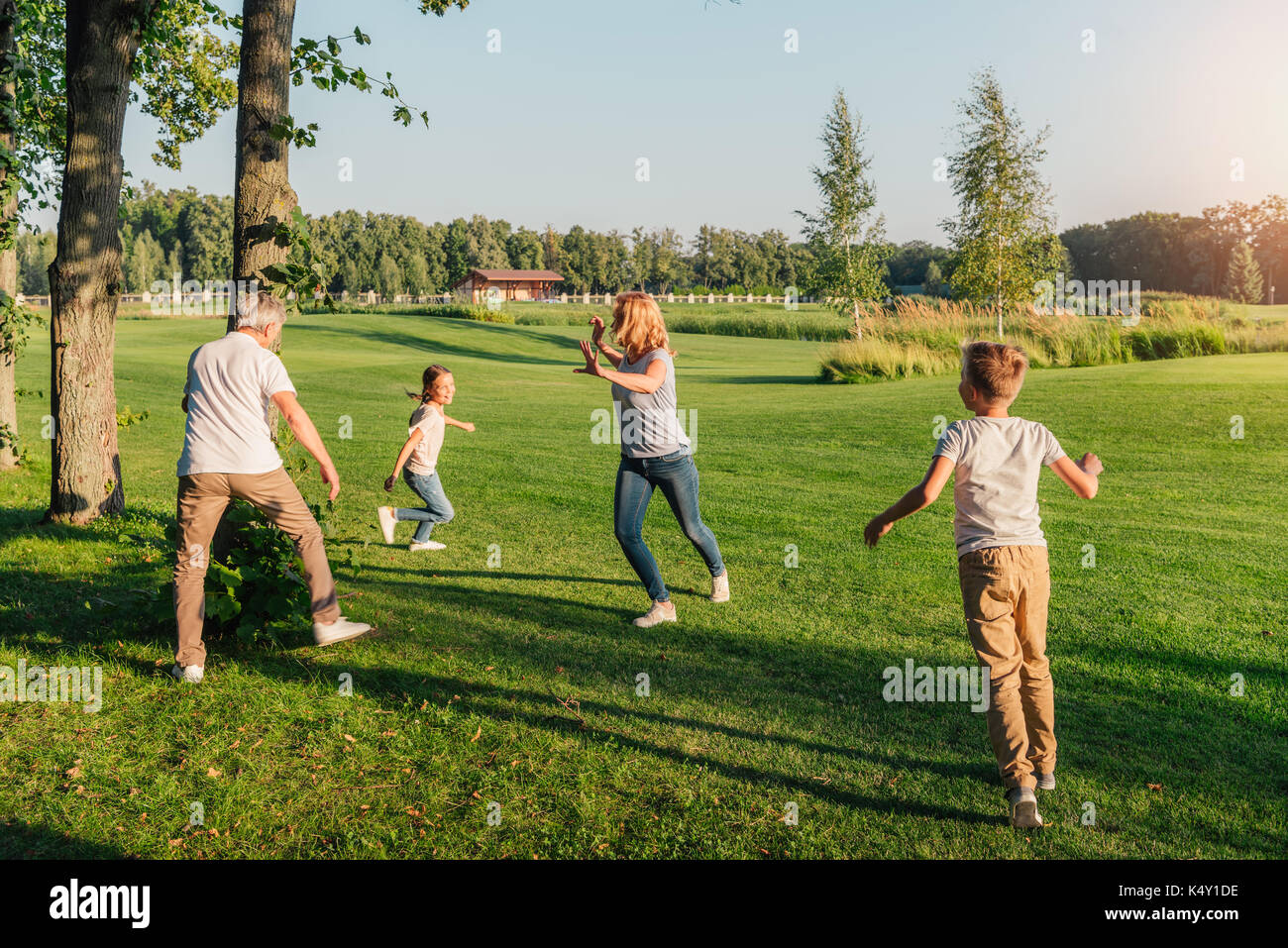 Family play run hi-res stock photography and images - Alamy