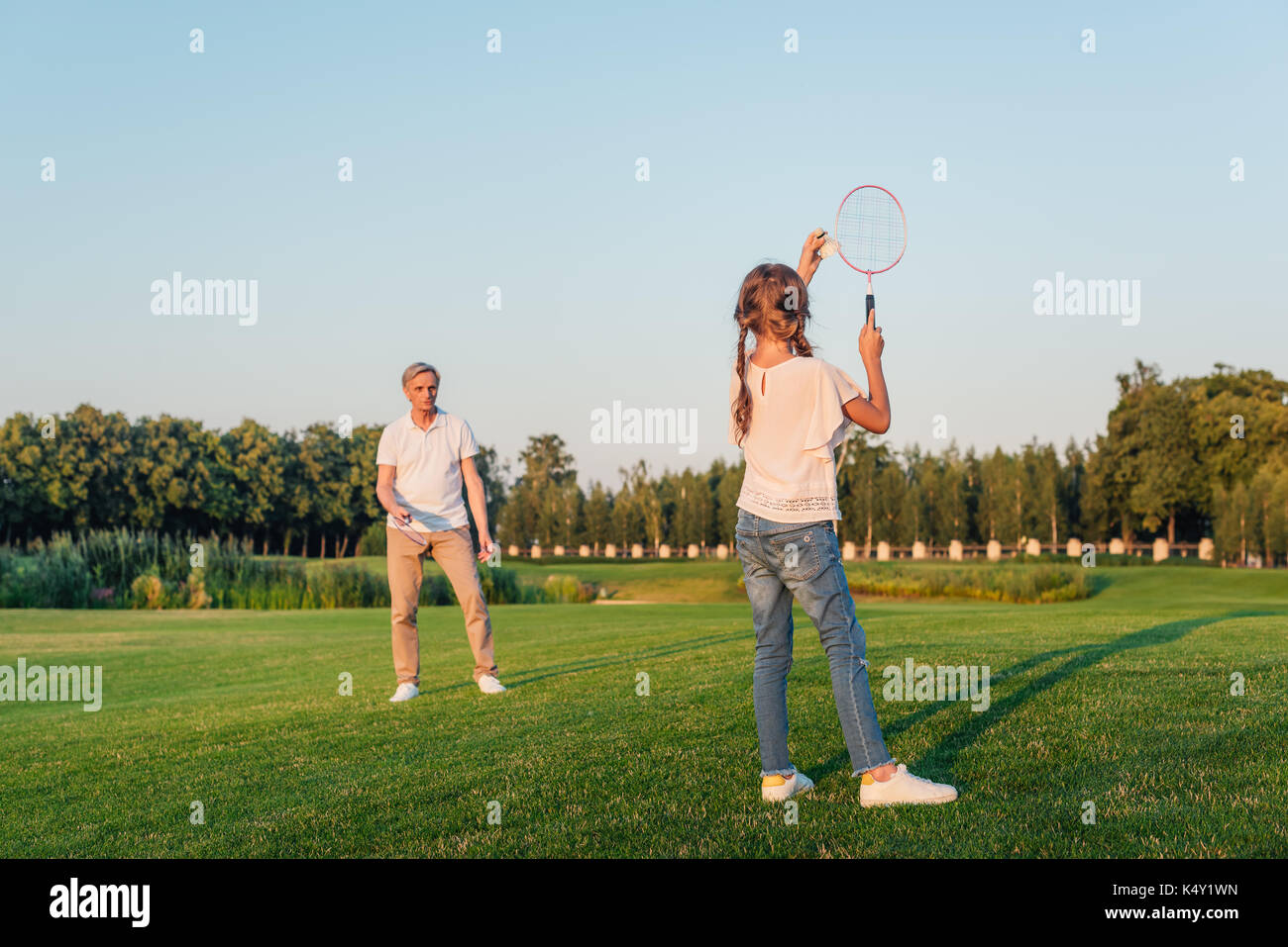 family playing badminton Stock Photo - Alamy