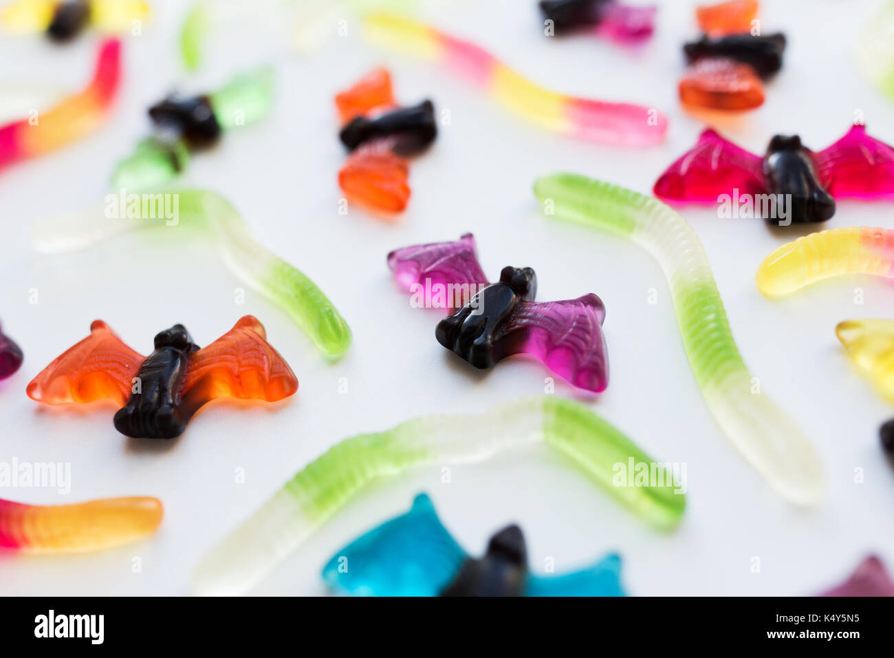 gummy worms and bet candies for halloween party Stock Photo - Alamy