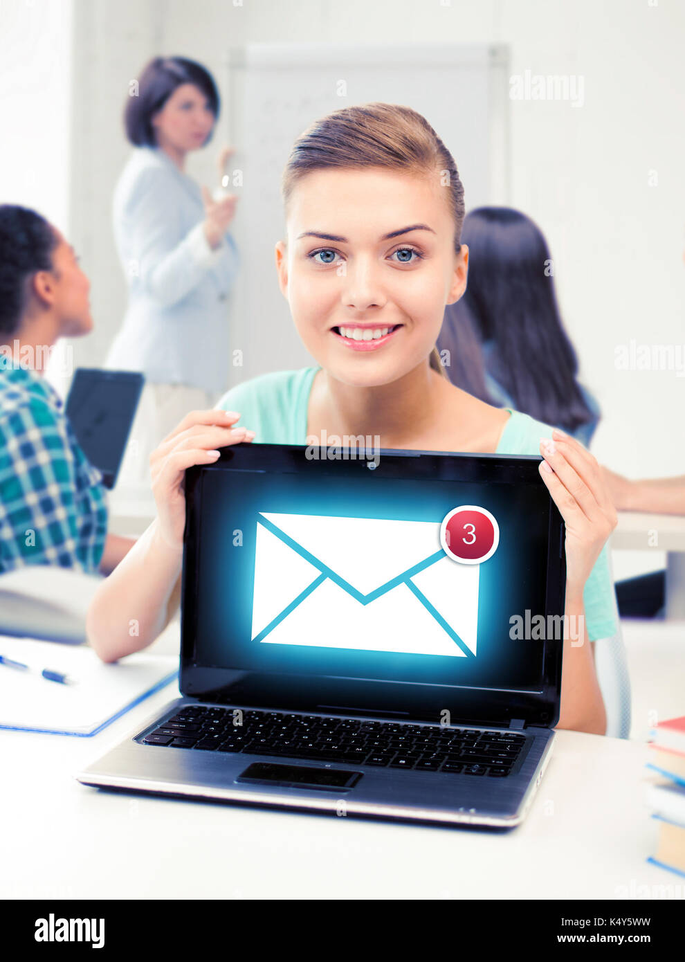 Laptop girl message email hi-res stock photography and images - Alamy