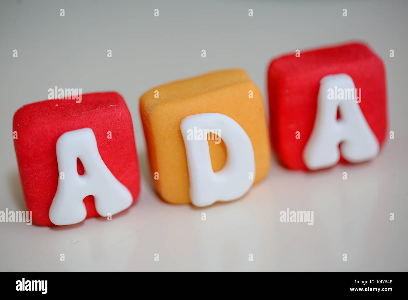 Ada name tag made of edible cake material Stock Photo - Alamy