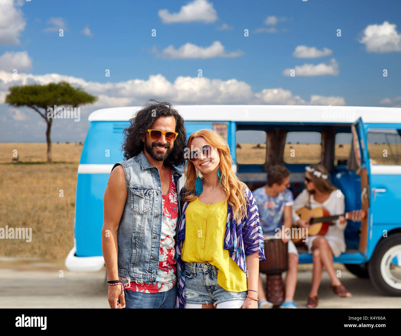 happy hippie couples and minivan in africa Stock Photo - Alamy