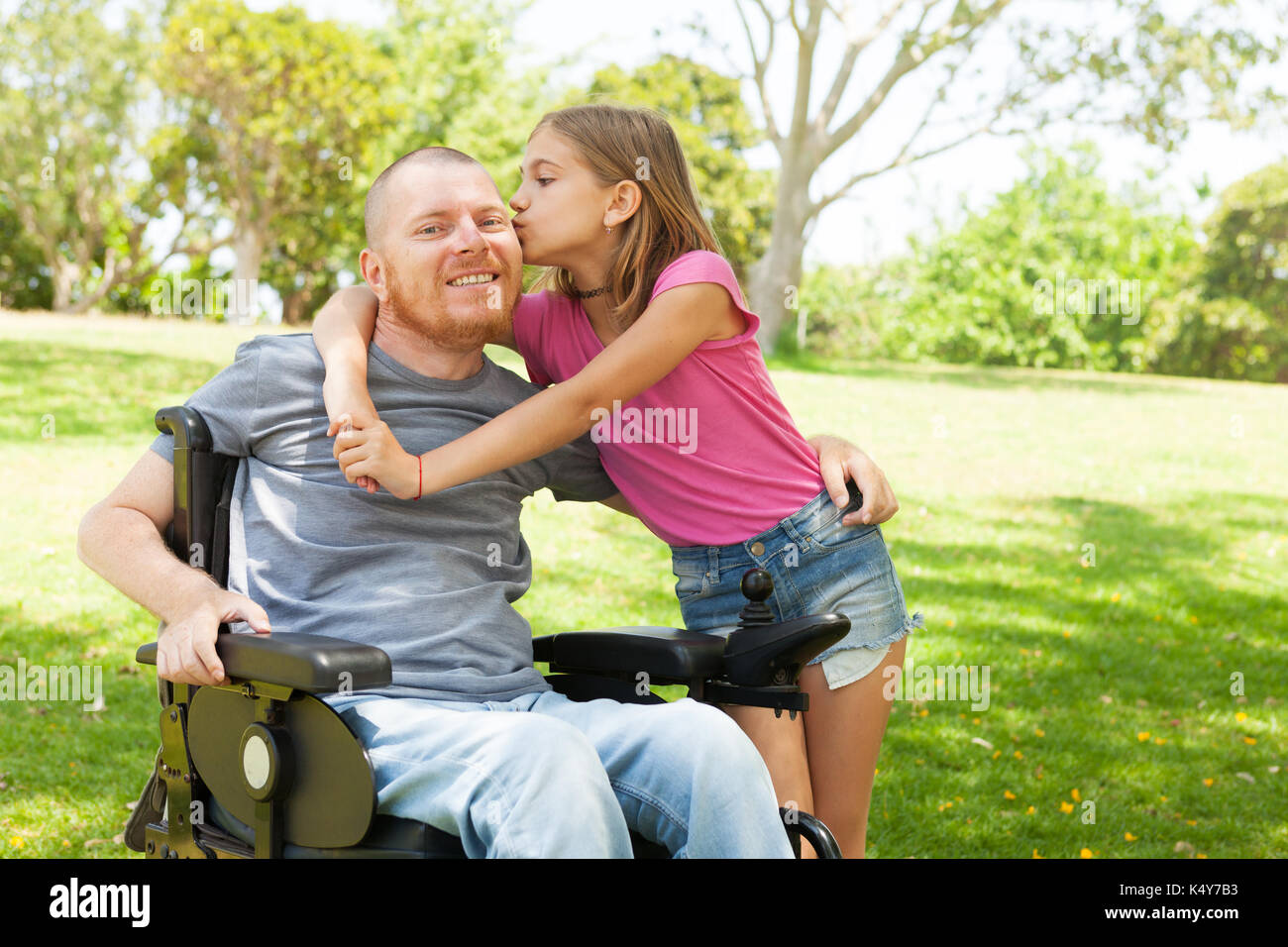 Disabled father with his little daughter Stock Photo - Alamy