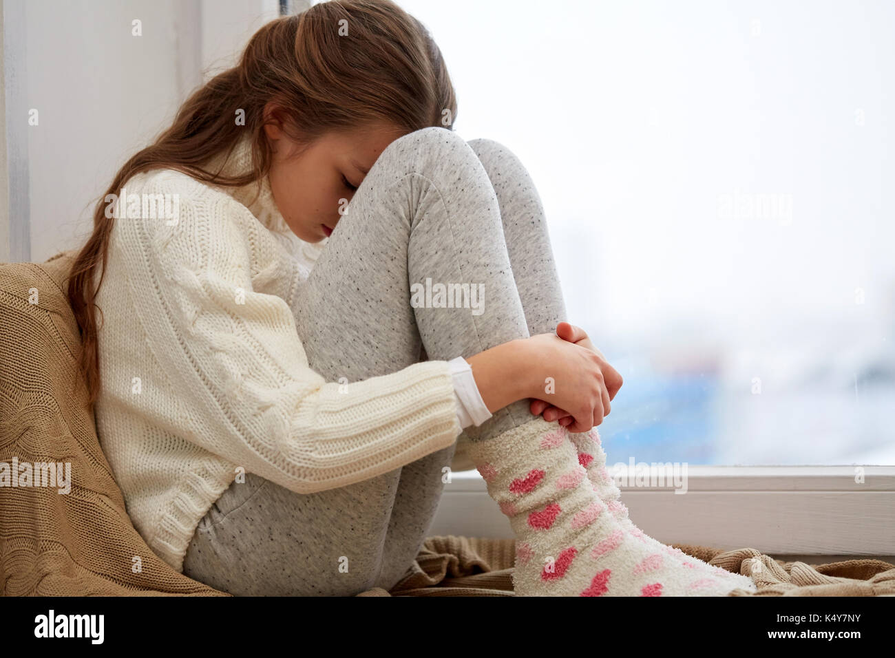 Sad preteen girl hi-res stock photography and images - Alamy