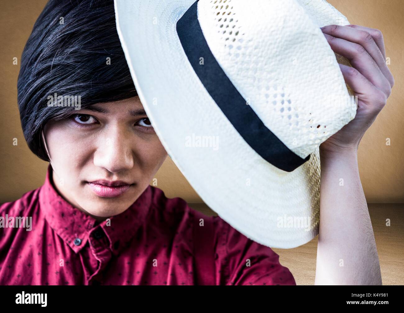Digital composite of Close up of millennial man tipping hat against ...
