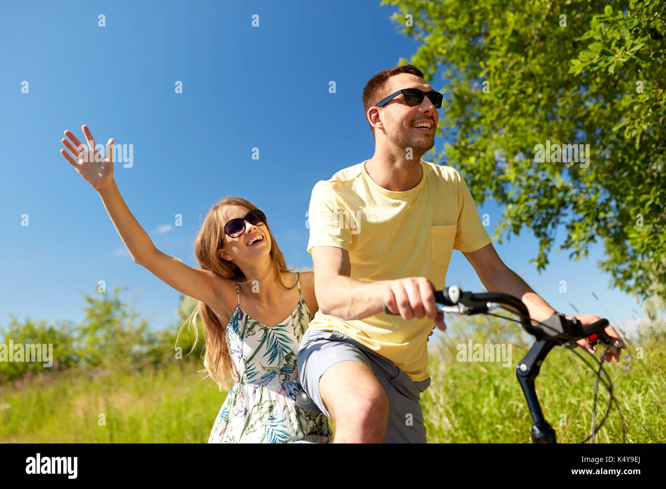 Girl having fun riding bicycle hi-res stock photography and images - Alamy