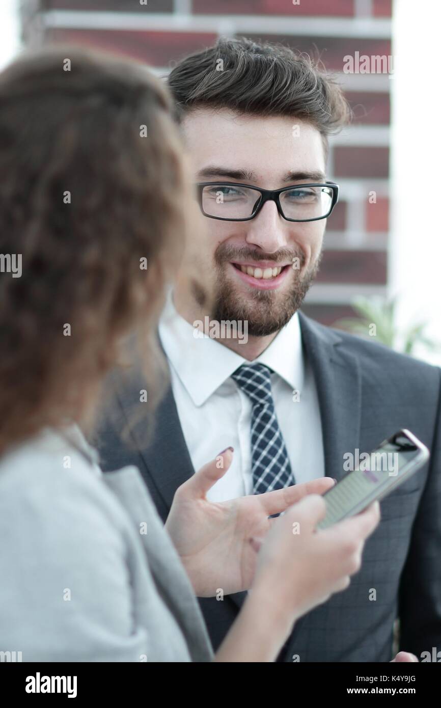 business partners communicating before the start of the official ...