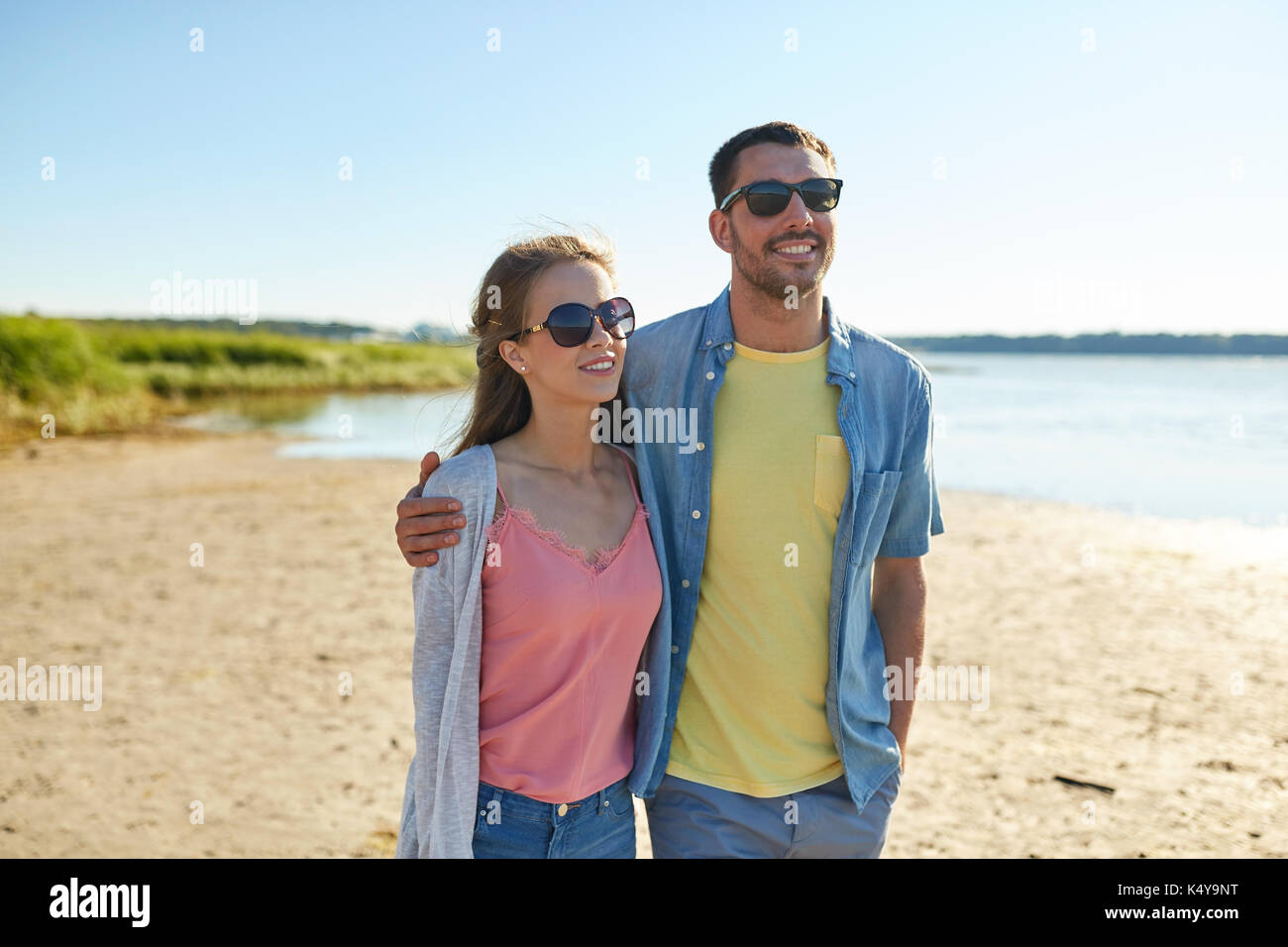 Beautiful woman man hugging smiling hi-res stock photography and images ...