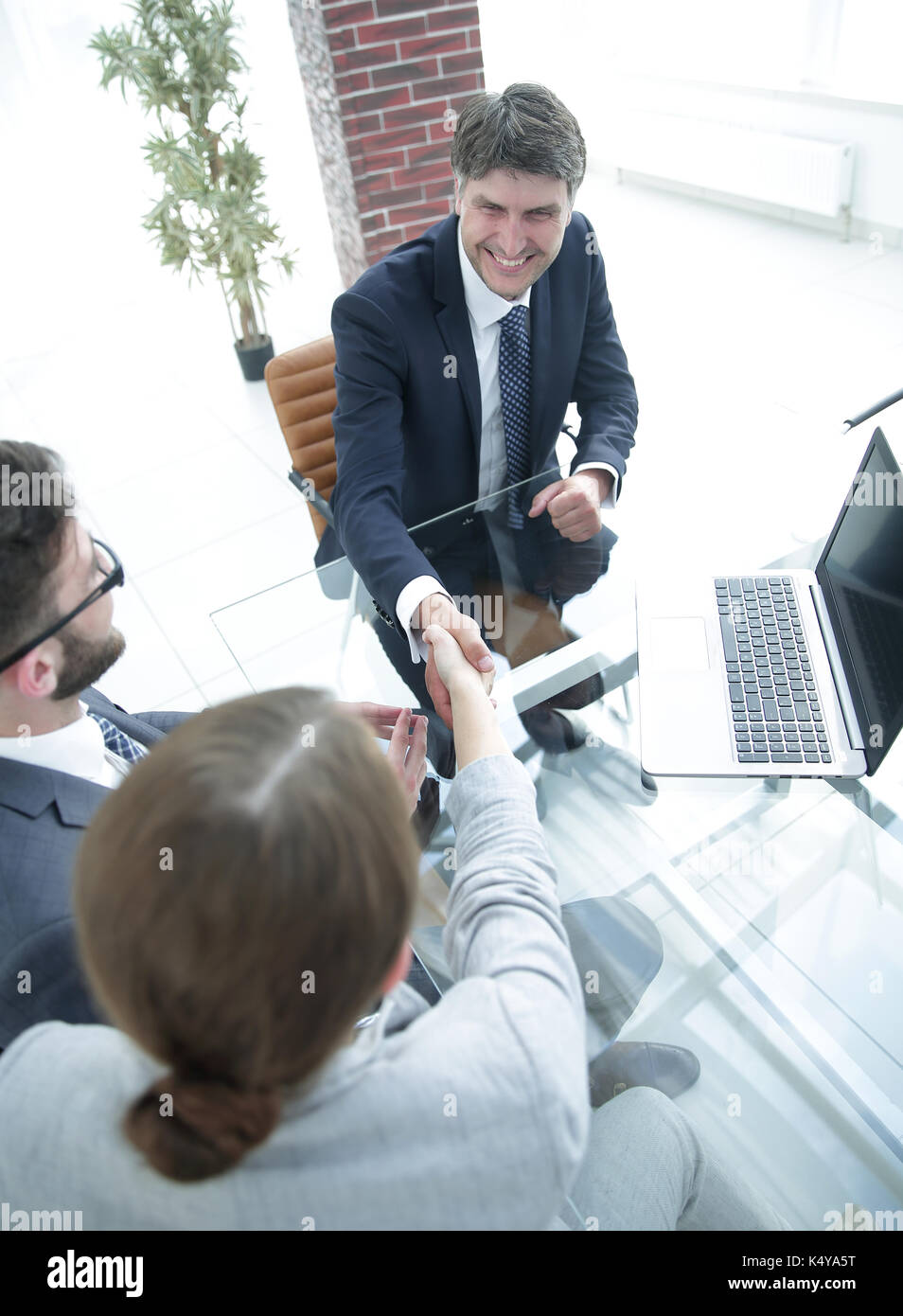 welcome handshake between a lawyer and a client Stock Photo - Alamy