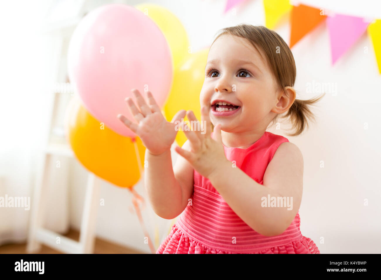 happy baby girl on birthday party at home Stock Photo - Alamy