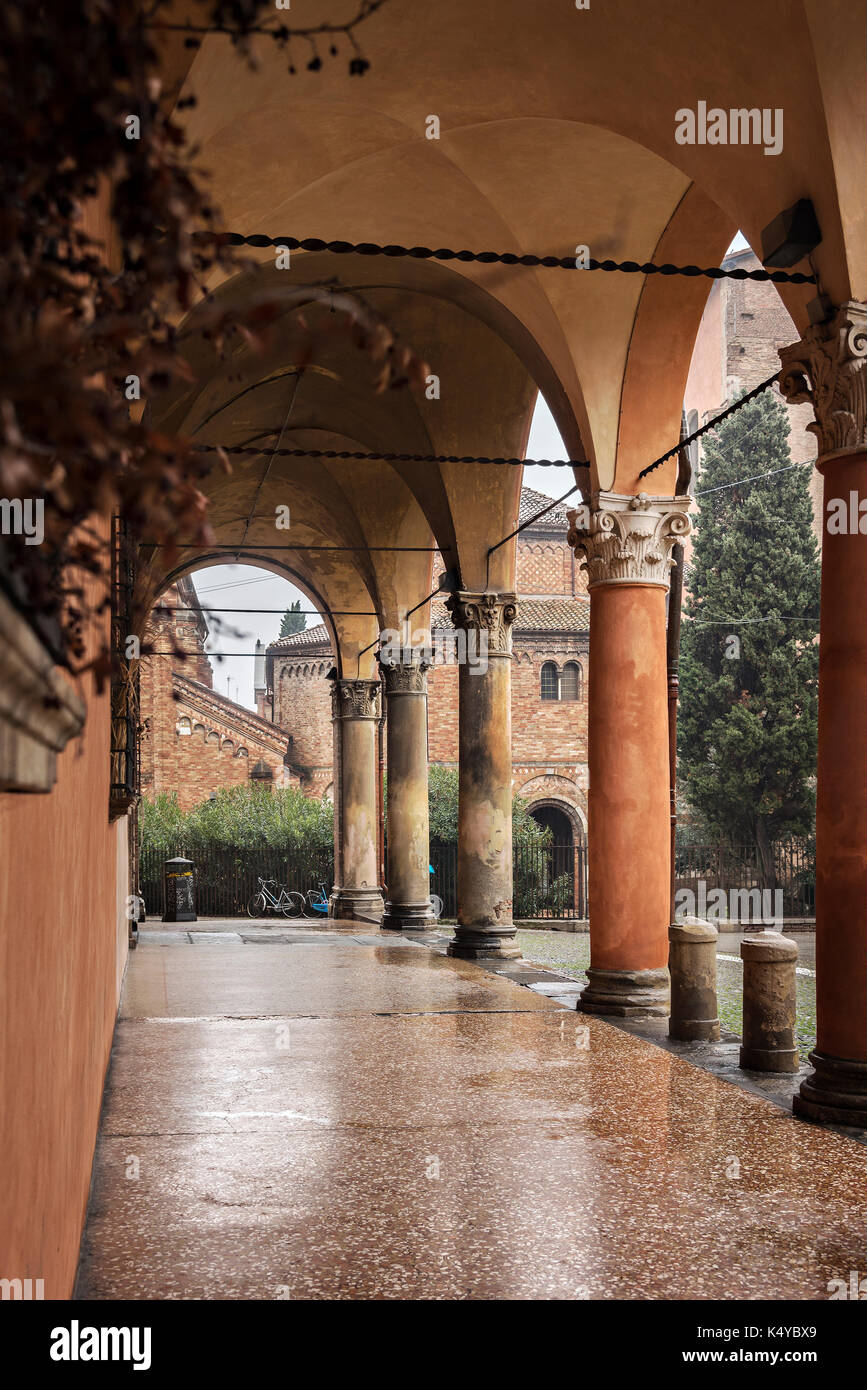 Image of covered walkway by Corte Isolani and the church of Santo ...