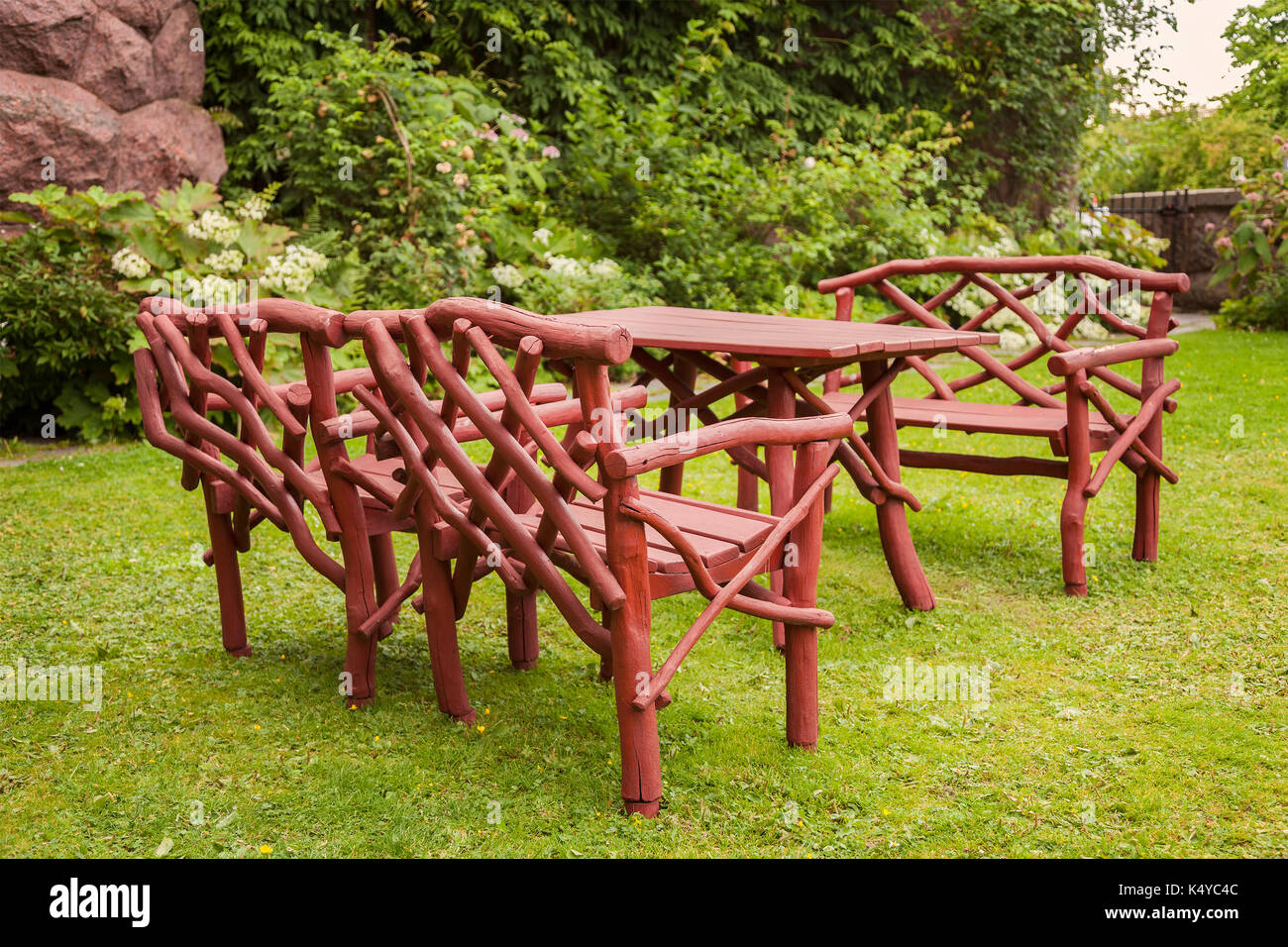 Image of rustic wooden garden furiture Stock Photo - Alamy