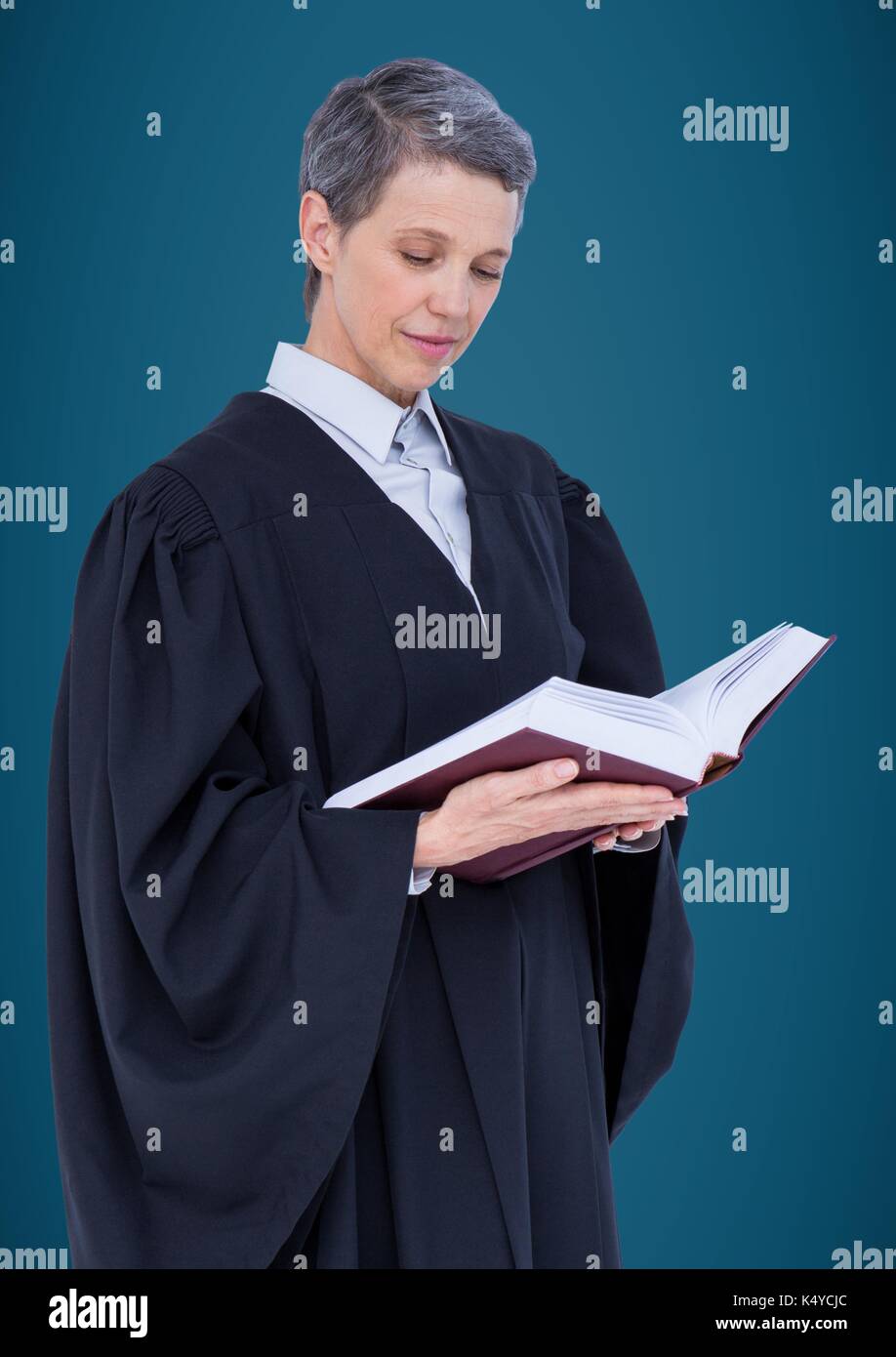 Digital composite of Female judge reading against blue background Stock ...