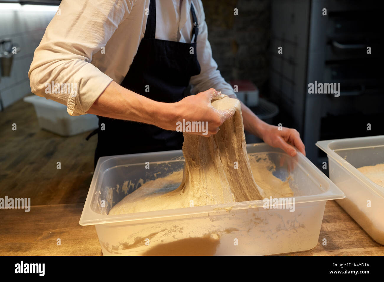 Baker making bread hi-res stock photography and images - Alamy