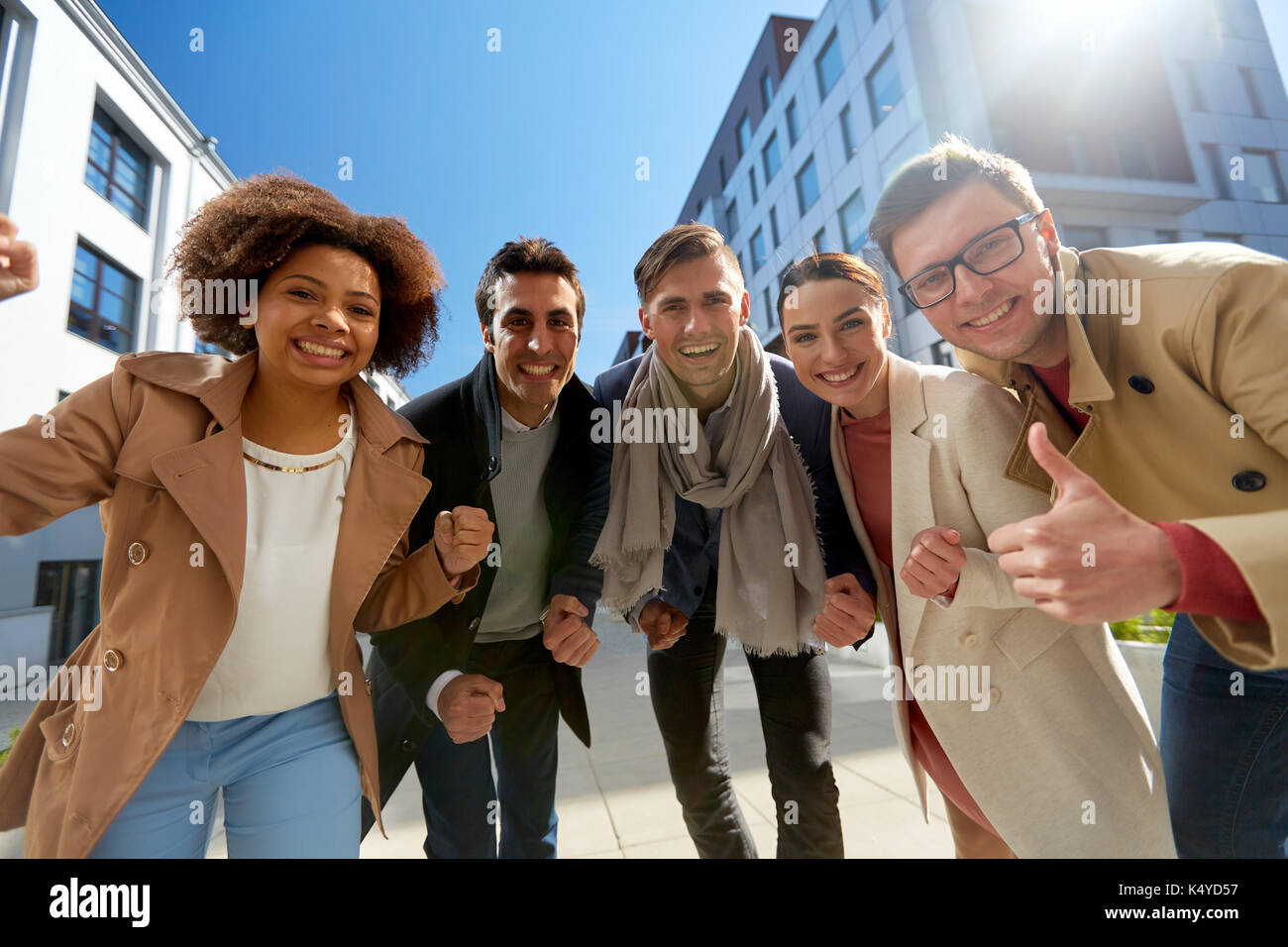 Business people thumbs up hi-res stock photography and images - Alamy