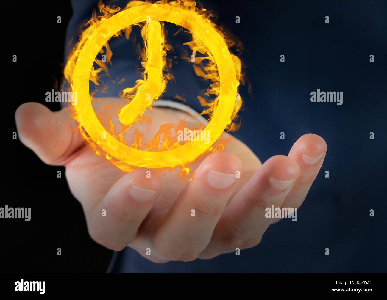 Digital composite of hand with clock fire icon over. Black background ...