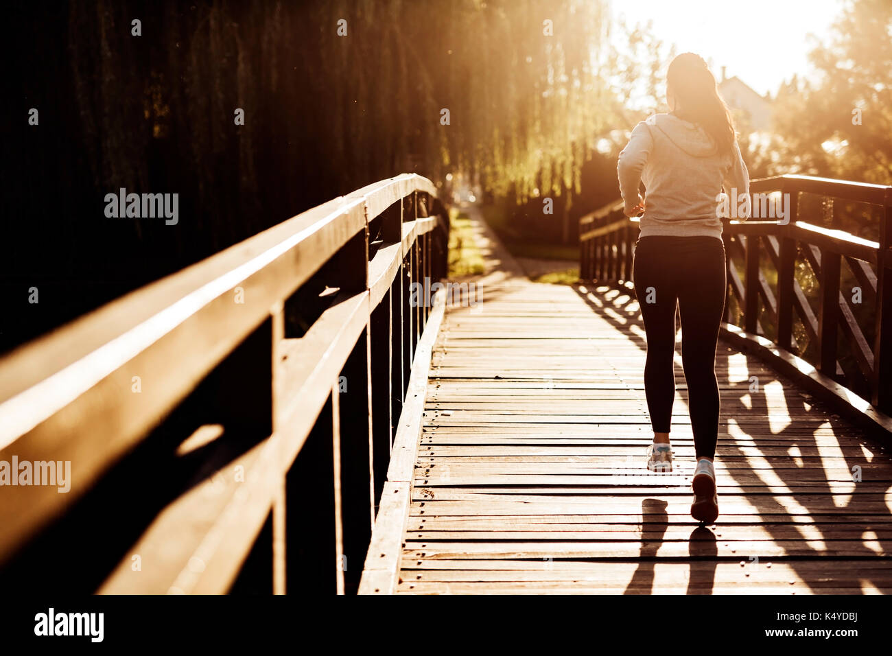 Beautiful female runner Stock Photo - Alamy