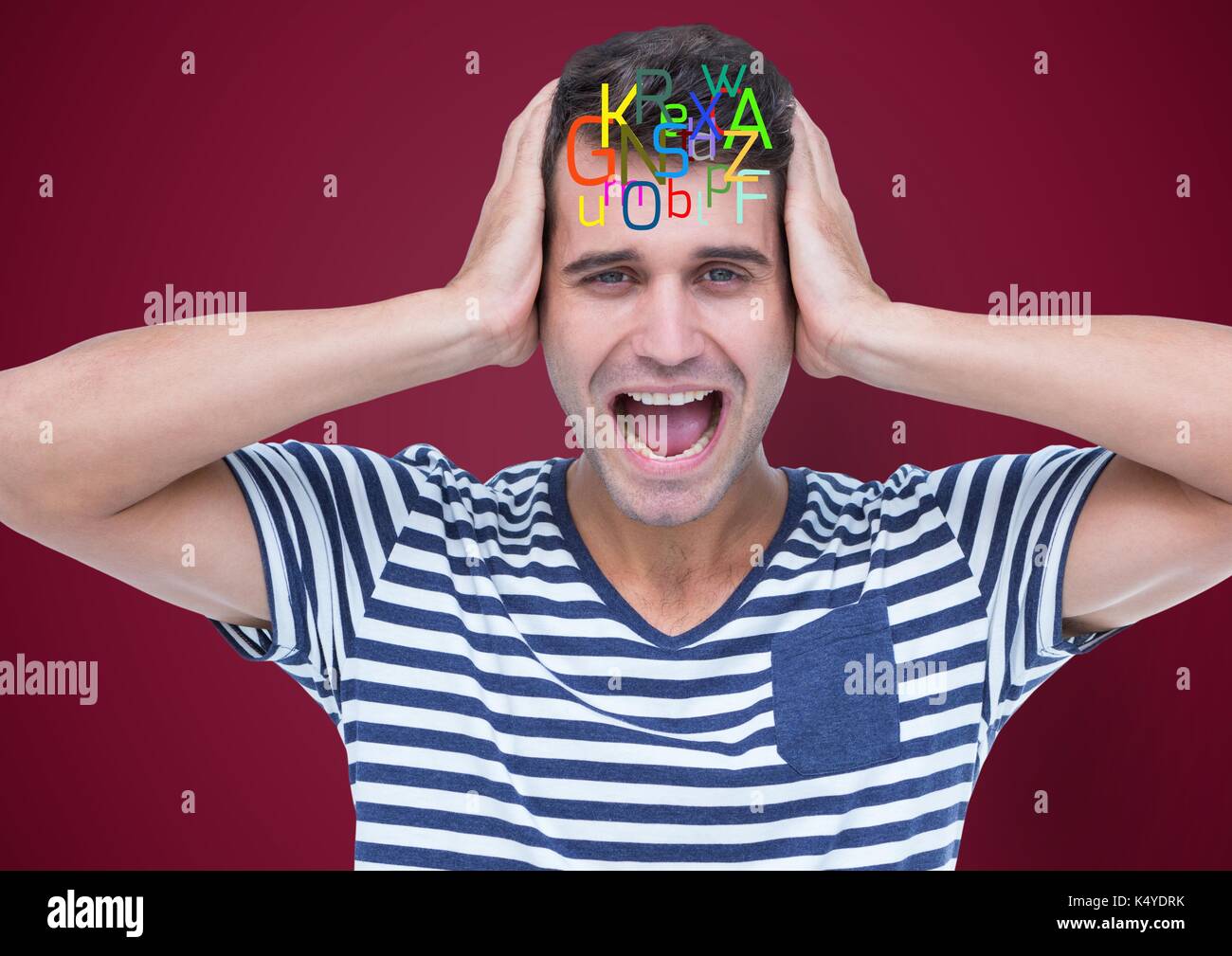 Digital composite of man shouting with colour letter on head Stock ...