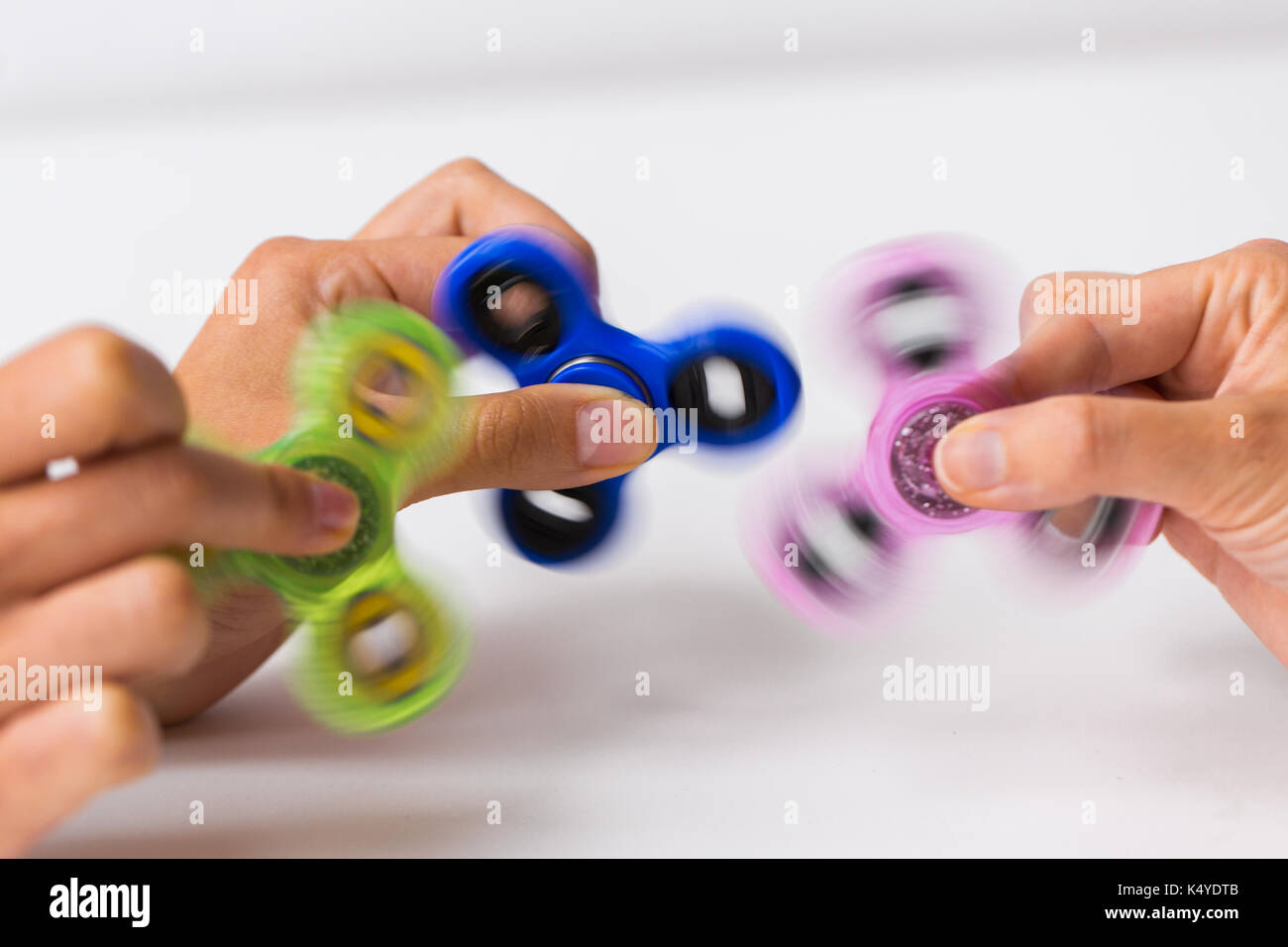 Fidget spinners group hi-res stock photography and images - Alamy