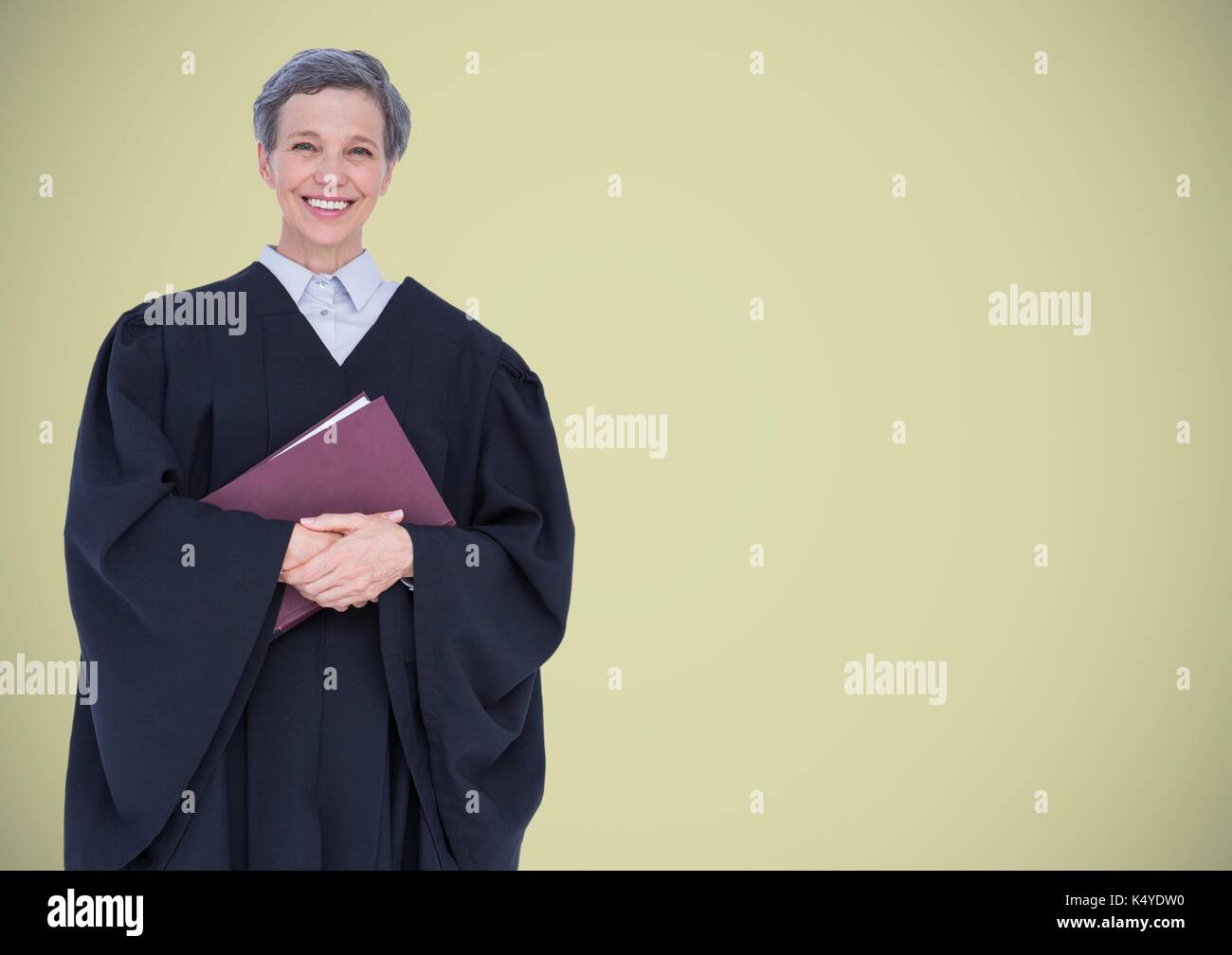 Digital composite of Female judge with book against light green ...