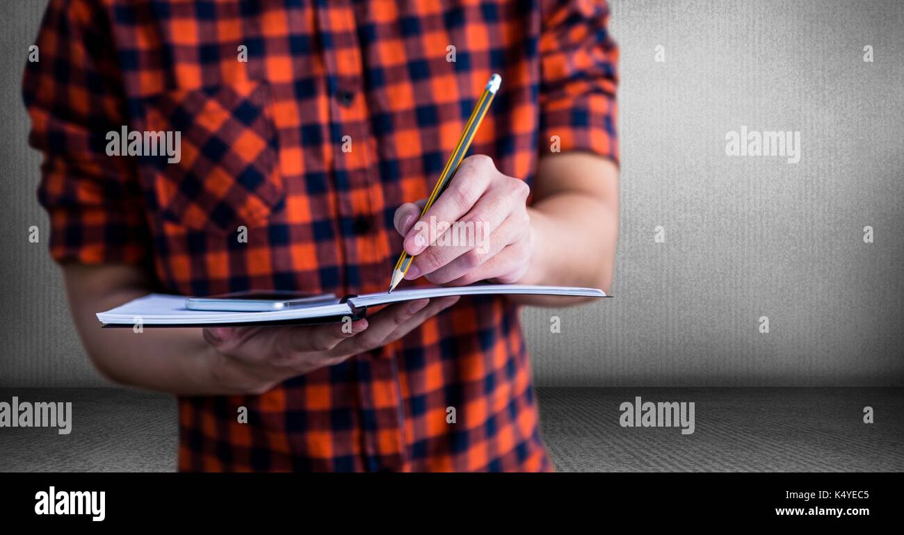 Man holding smartphone against concrete hi-res stock photography and ...