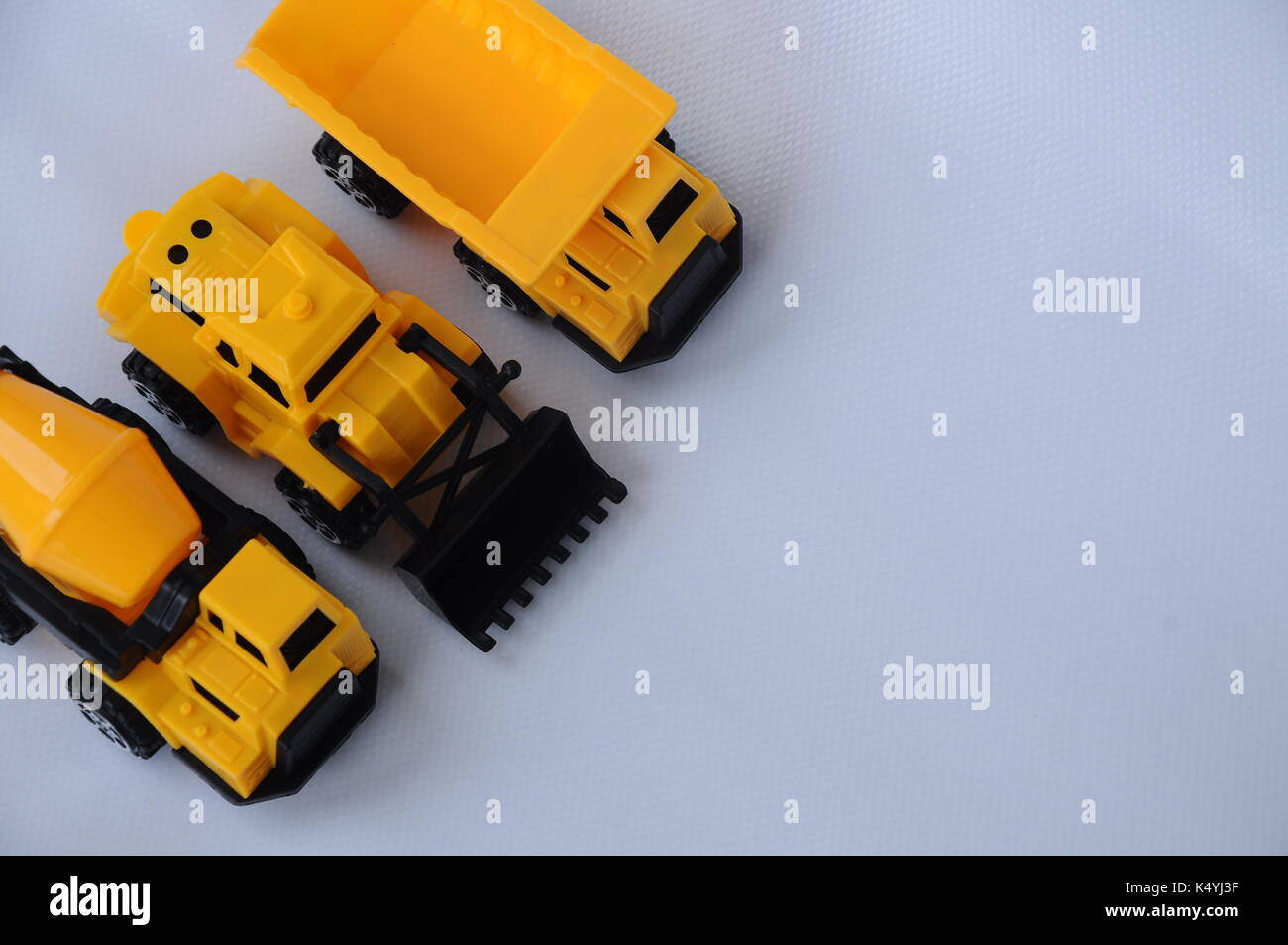 Group of small heavy construction machine toy, lorry, bulldozer and ...