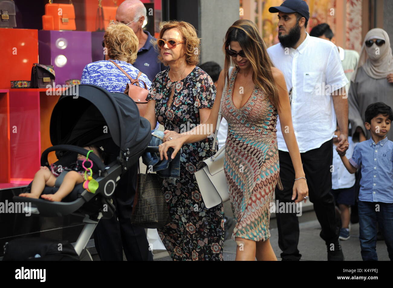 Milan, Cecilia Capriotti and mom in the center with the small Maria ...