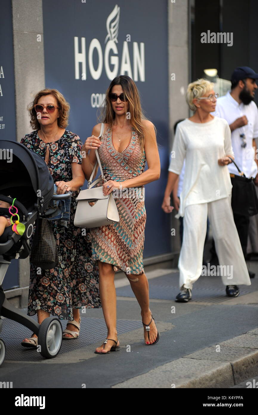 Milan, Cecilia Capriotti and mom in the center with the small Maria ...