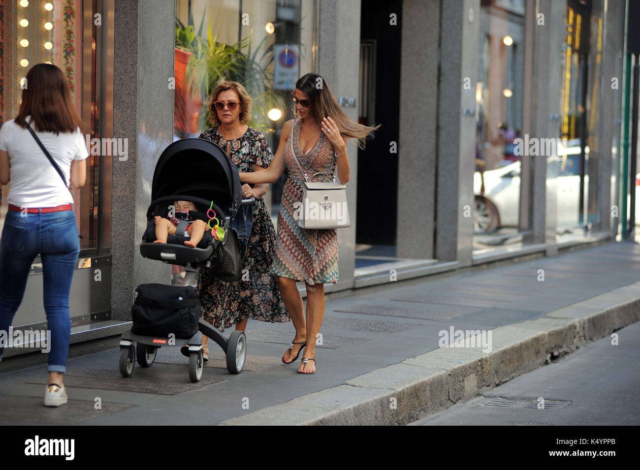 Milan, Cecilia Capriotti and mom in the center with the small Maria ...