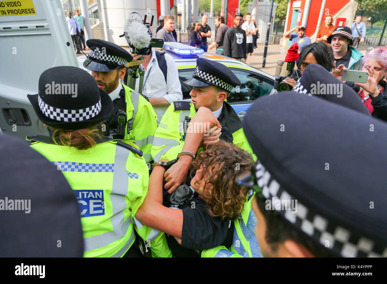 London, UK. 7th Sept, 2017.Protest at the DSEI Arms Fair. A woman ...