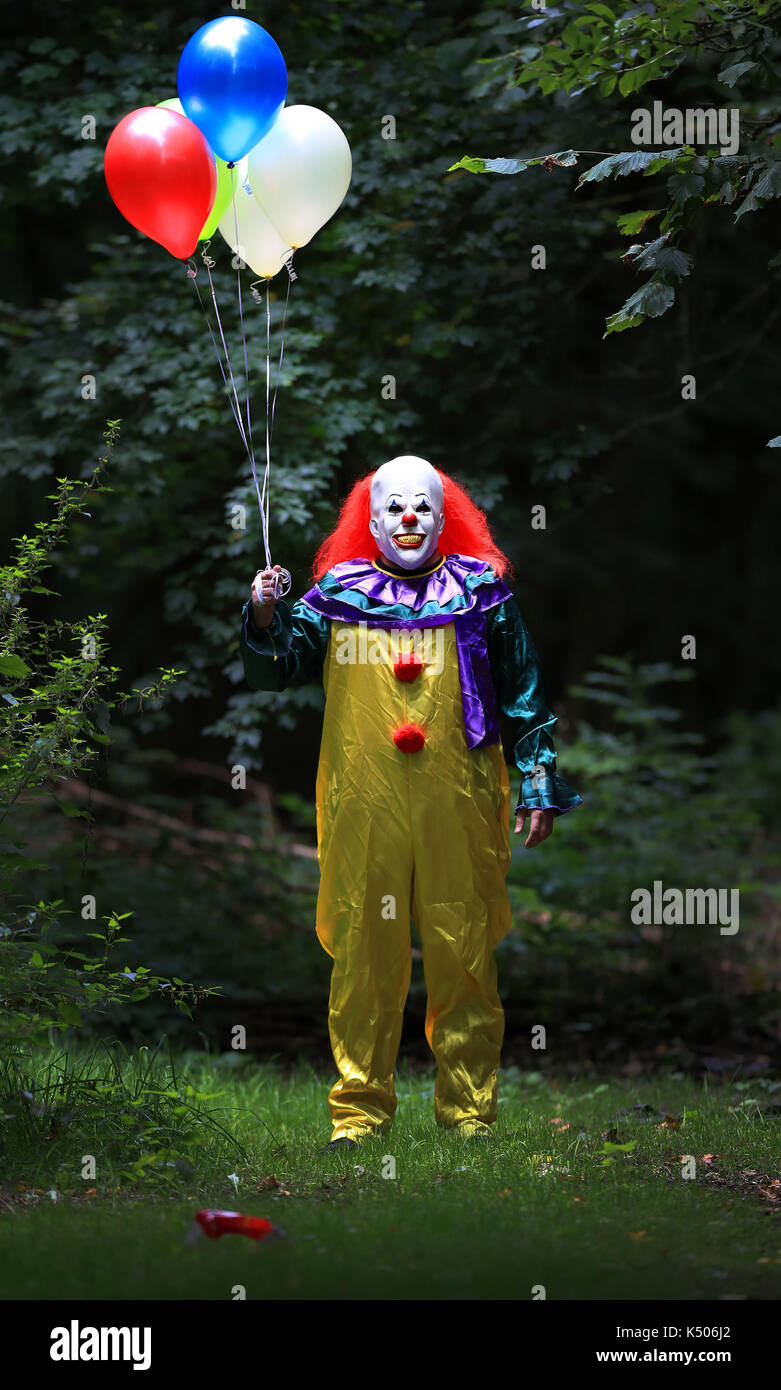 POSED BY MODEL A person wearing a clown costume in Liverpool, as ...