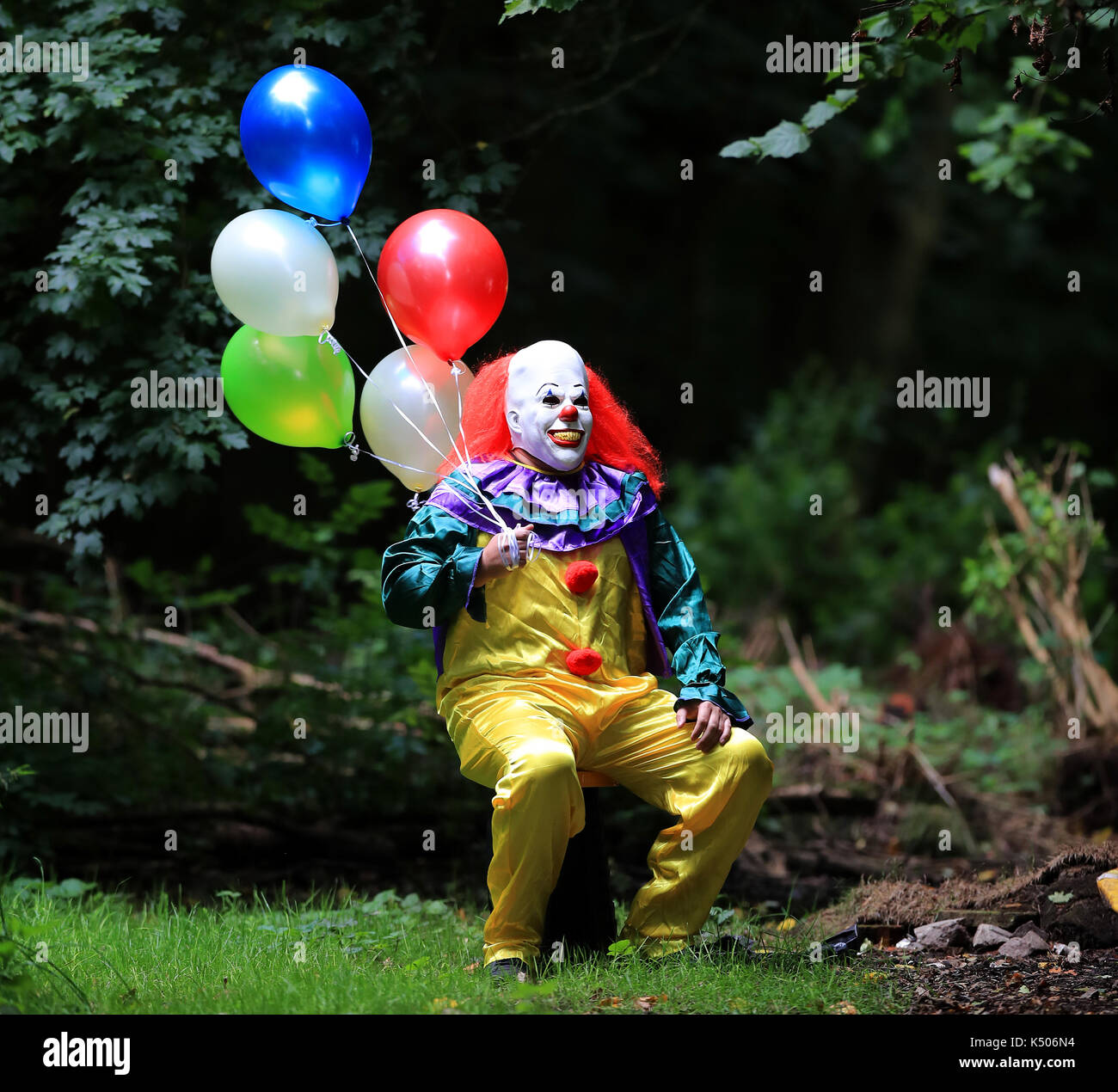 POSED BY MODEL A person wearing a clown costume in Liverpool, as ...