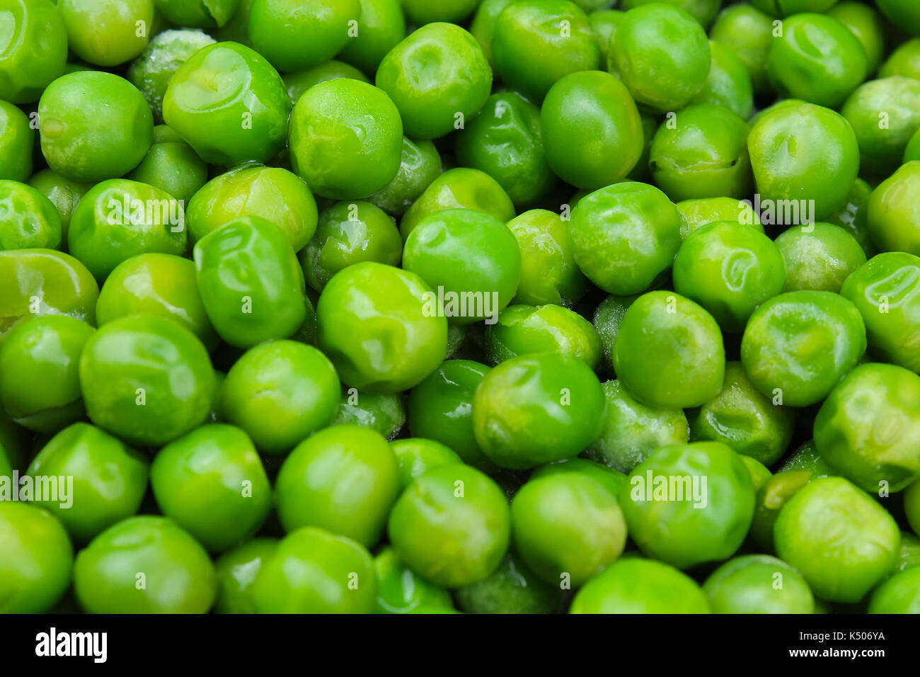 Frozen green pea peas texture Stock Photo - Alamy